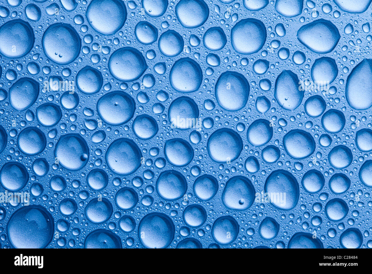 Water drops over background Stock Photo - Alamy