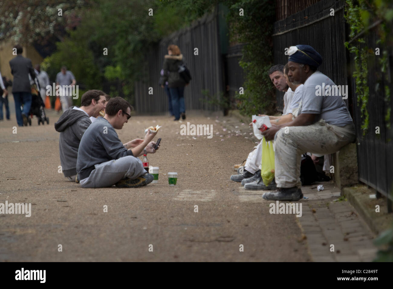 Builders construction workers taking lunch break Green Park London ...