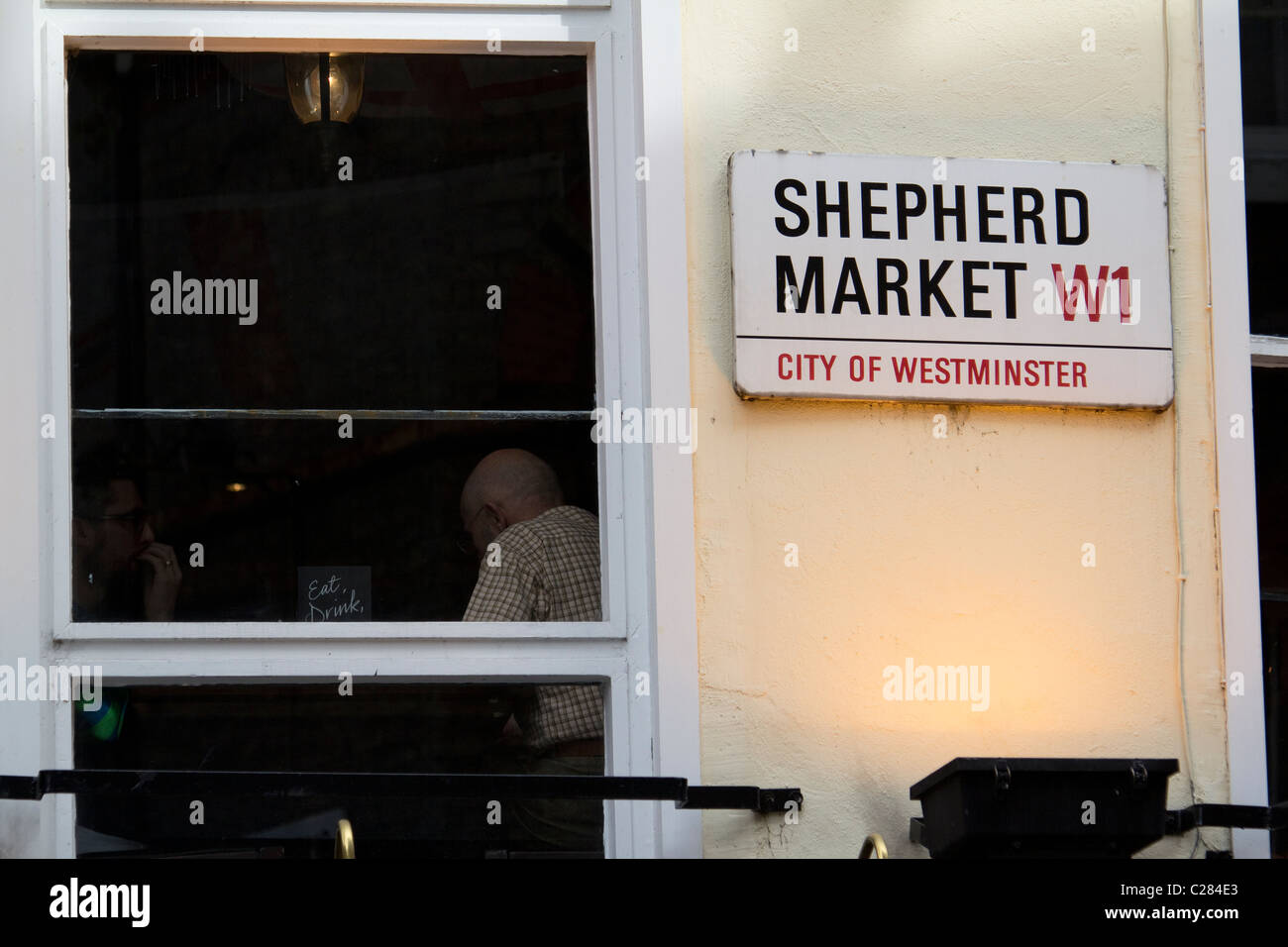 Shepherds Market street sign next to pub window Stock Photo - Alamy