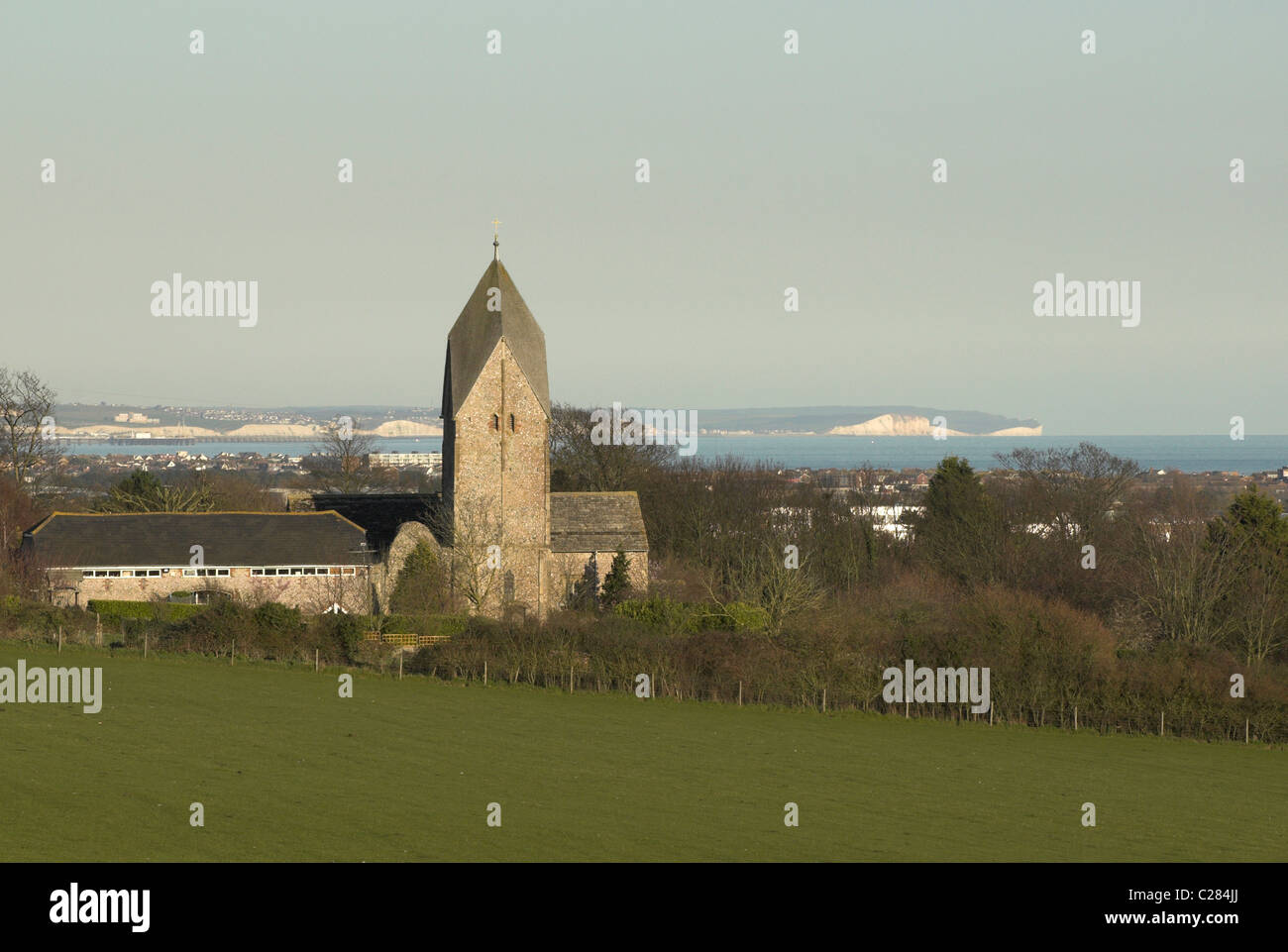 The Anglo-Saxon church of St Mary, Sompting, Sussex, nestling on the ...