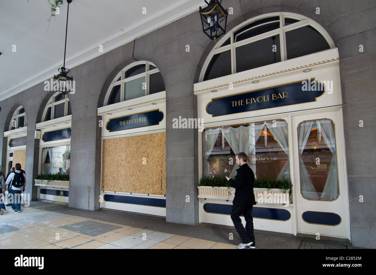 The Ritz Hotel in Piccadilly, London, boarded up after student riots ...