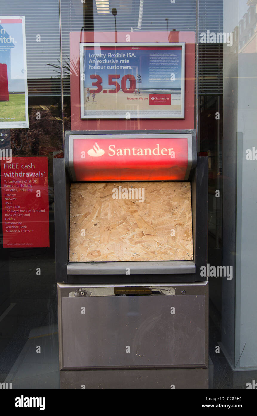 Santander Bank boarded up and after riots in London Stock Photo - Alamy
