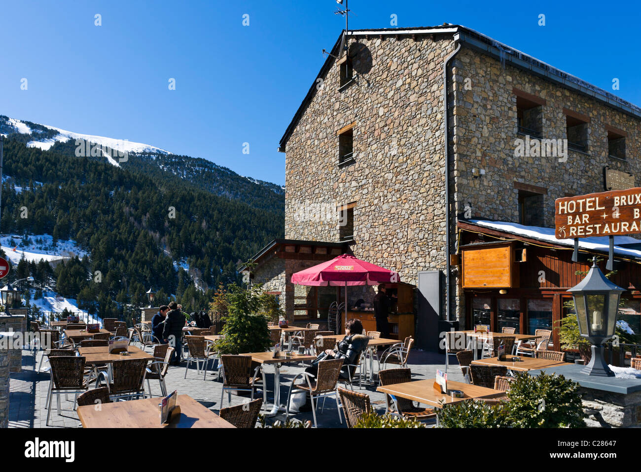 Bar terrace on the main street in the resort centre, Soldeu ...
