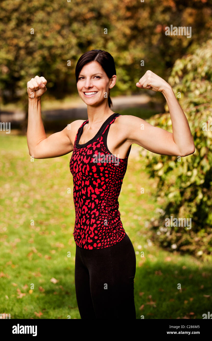 Strong woman muscles flexing flex hi-res stock photography and images ...