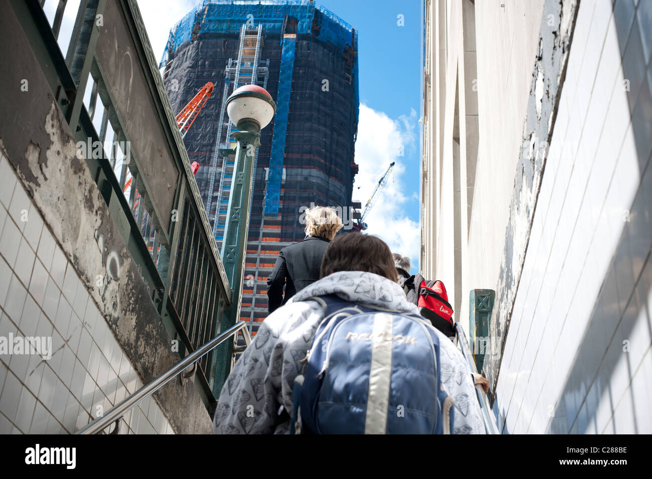 Visitors exiting the World Trade Center subway terminal view the under ...