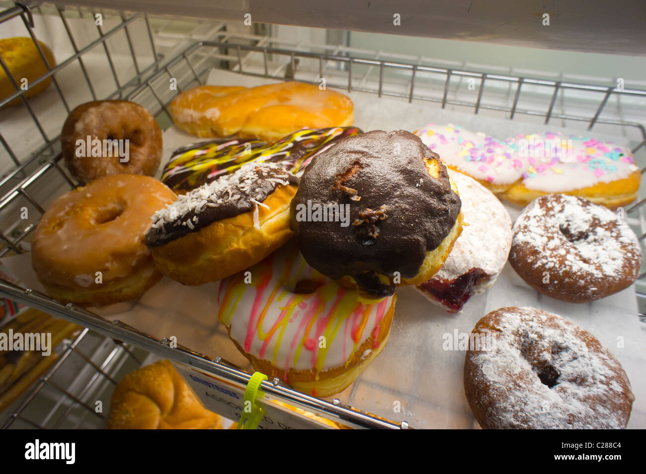Assorted donuts are seen in a supermarket bakery department in New York ...