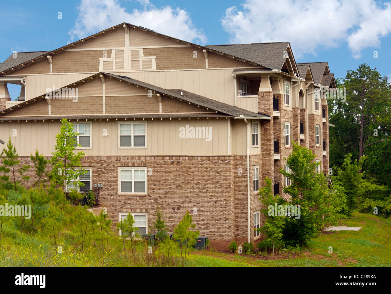 Side view of newly built condominium buildings Stock Photo - Alamy