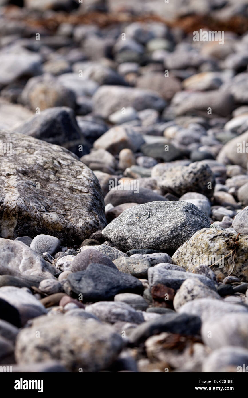 A coastal rock background with round water washed rocks Stock Photo - Alamy