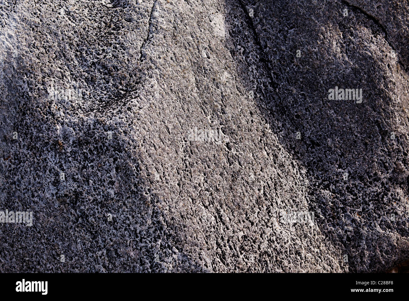 A surface texture of a stone - background image Stock Photo - Alamy