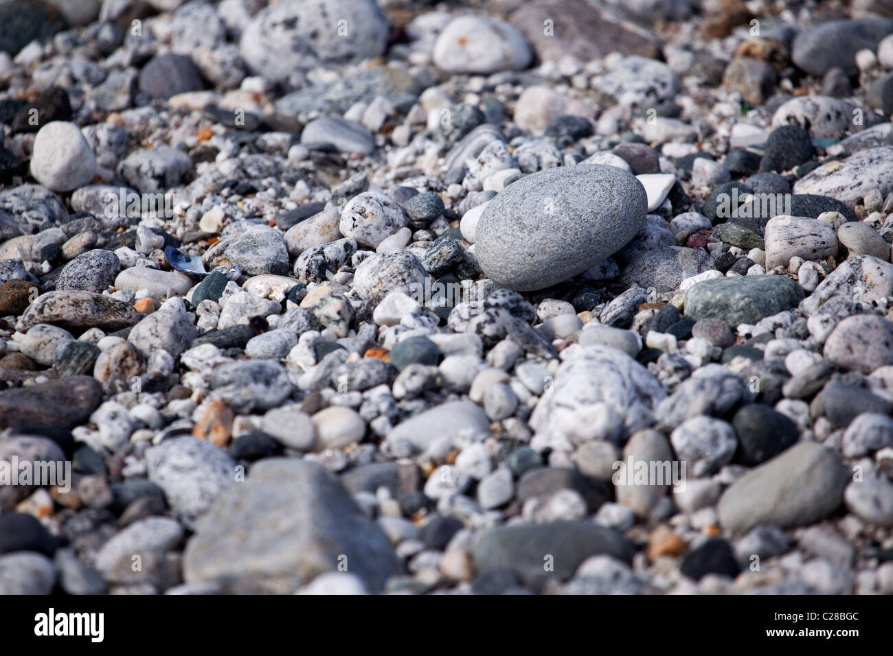 A smooth pebble surface texture background Stock Photo - Alamy