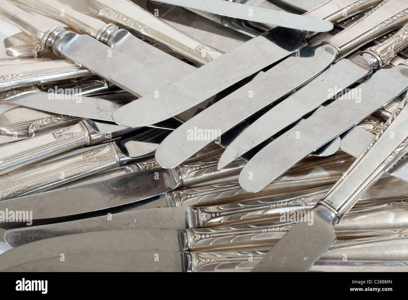 Sterling silver scrap knives for melt Stock Photo - Alamy