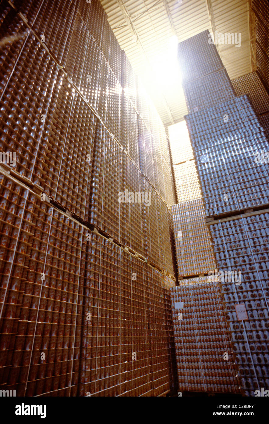 Huge stacks of beer on pallets in a large distribution warehouse Stock ...