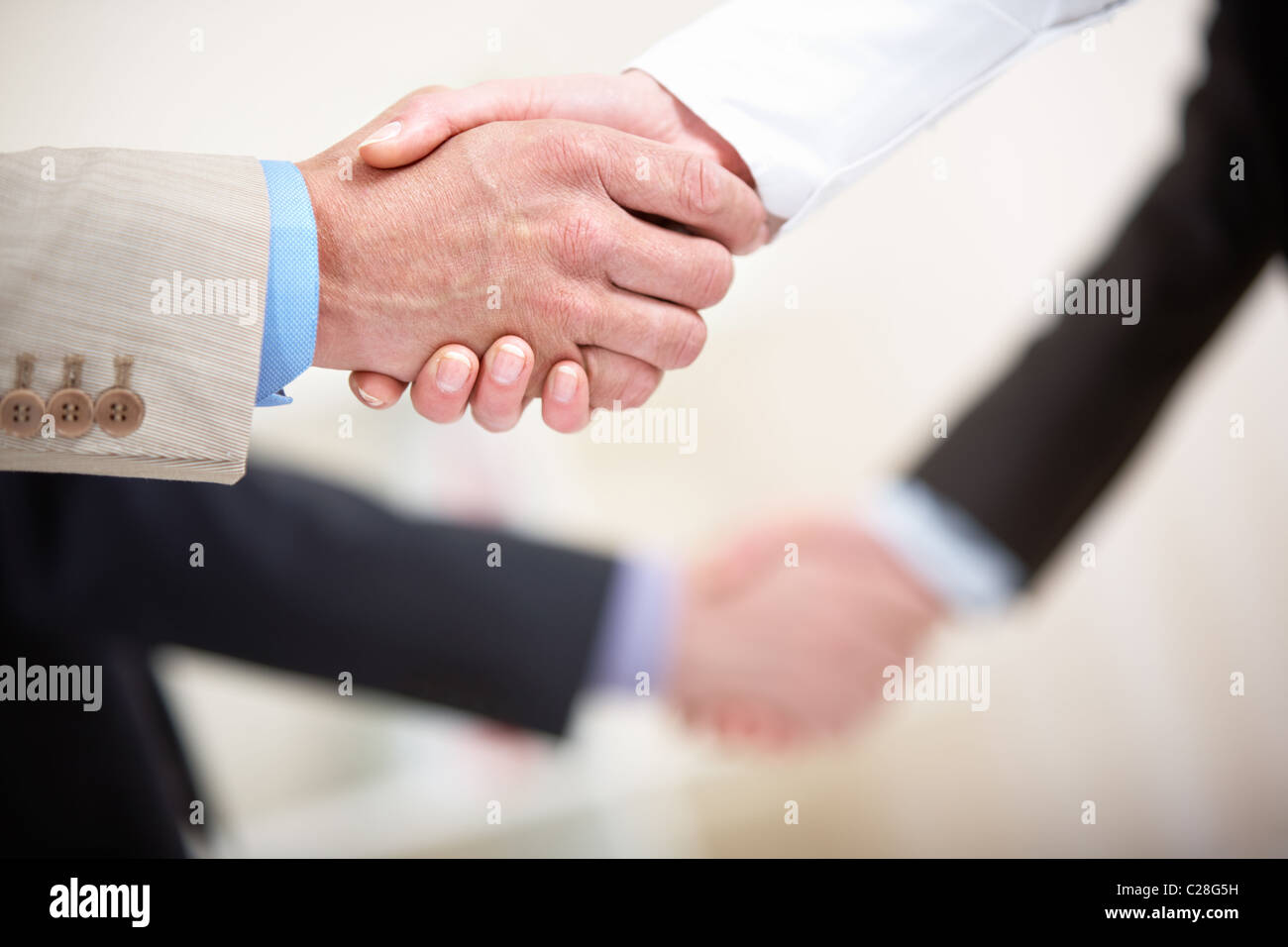 Photo of business handshakes in line Stock Photo - Alamy