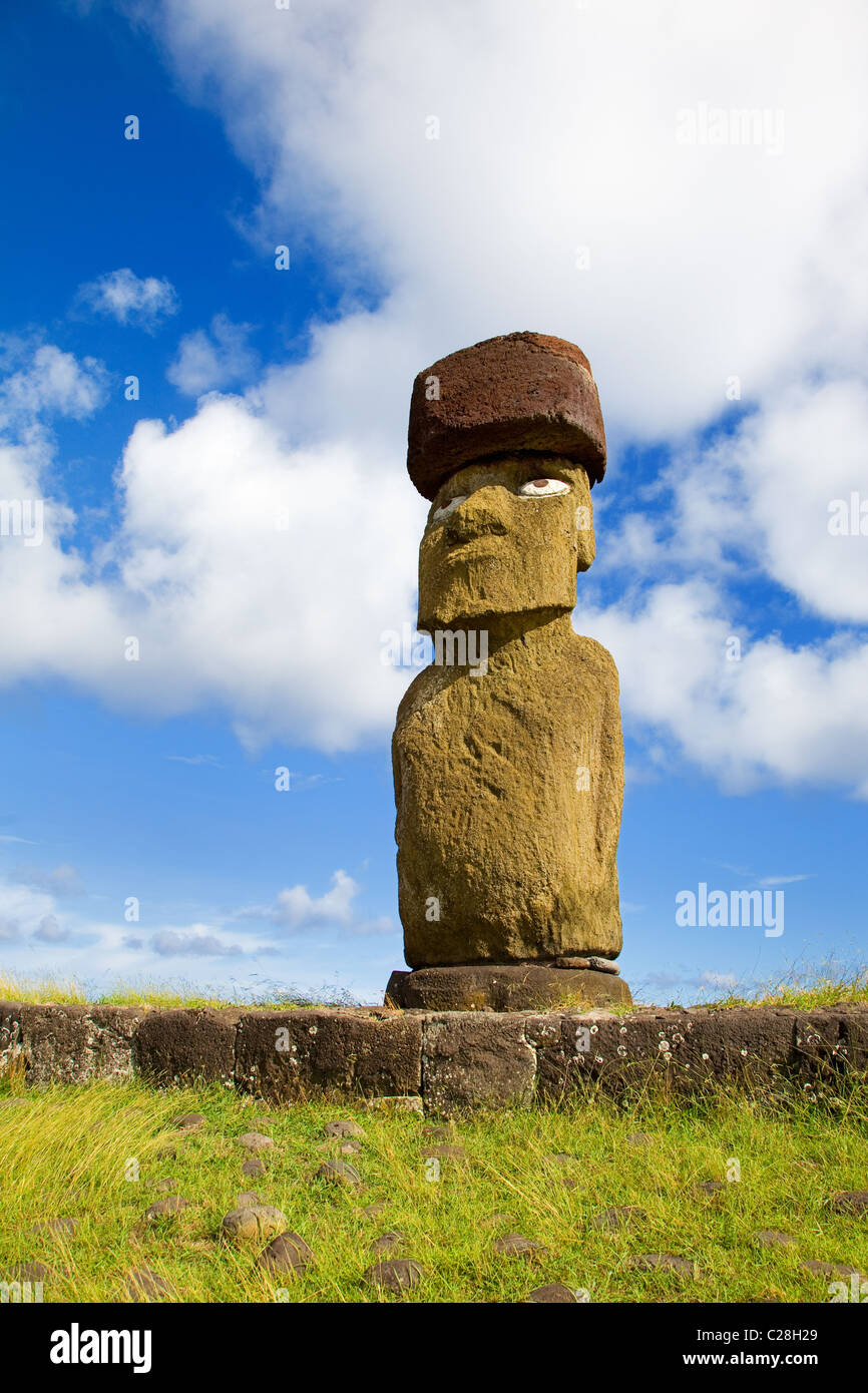 Single Moai statue in front of blue sky easter island Stock Photo - Alamy