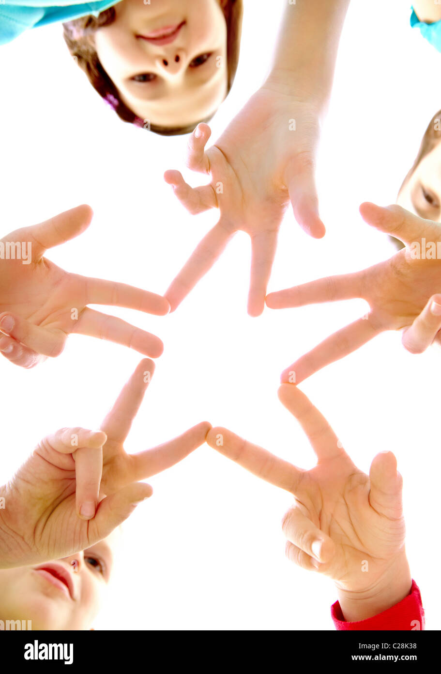 Photo of joyful children making star by their finger Stock Photo - Alamy