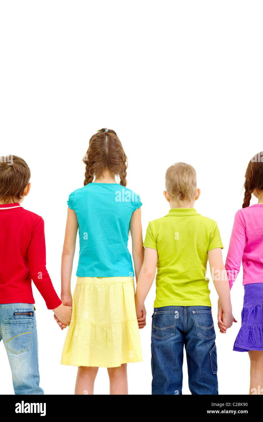 View rear of children holding by hands together Stock Photo - Alamy