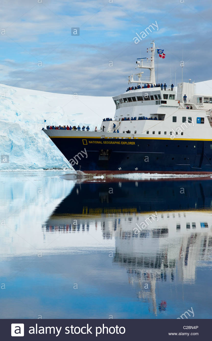 National Geographic Explorer cruise ship reflected in polar waters ...