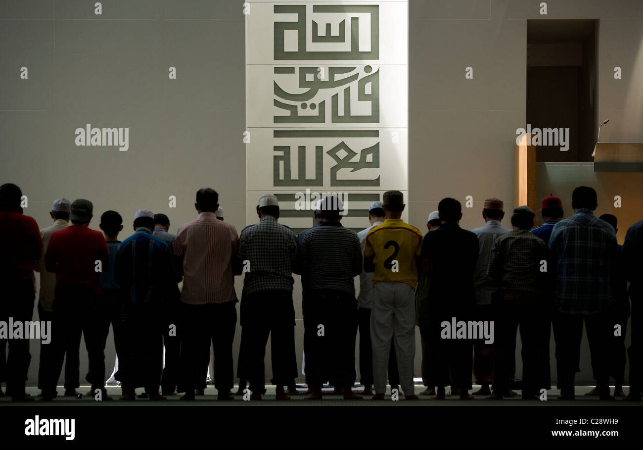 Men pray in the main prayer hall at the Assyafaah Mosque in Singapore ...