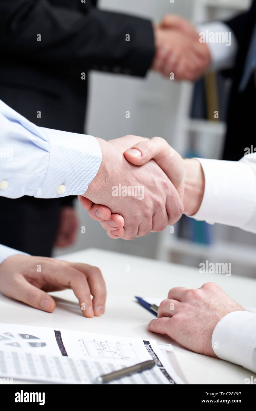 Close-up of two shaking hands Stock Photo - Alamy