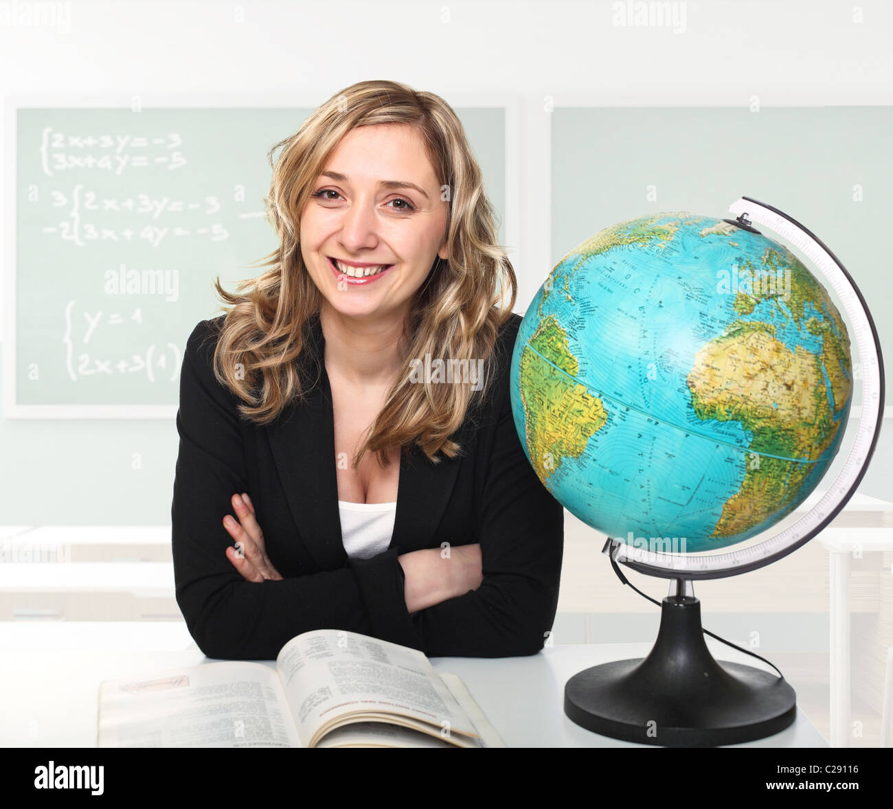 caucasian smiling teacher take lesson at school Stock Photo - Alamy