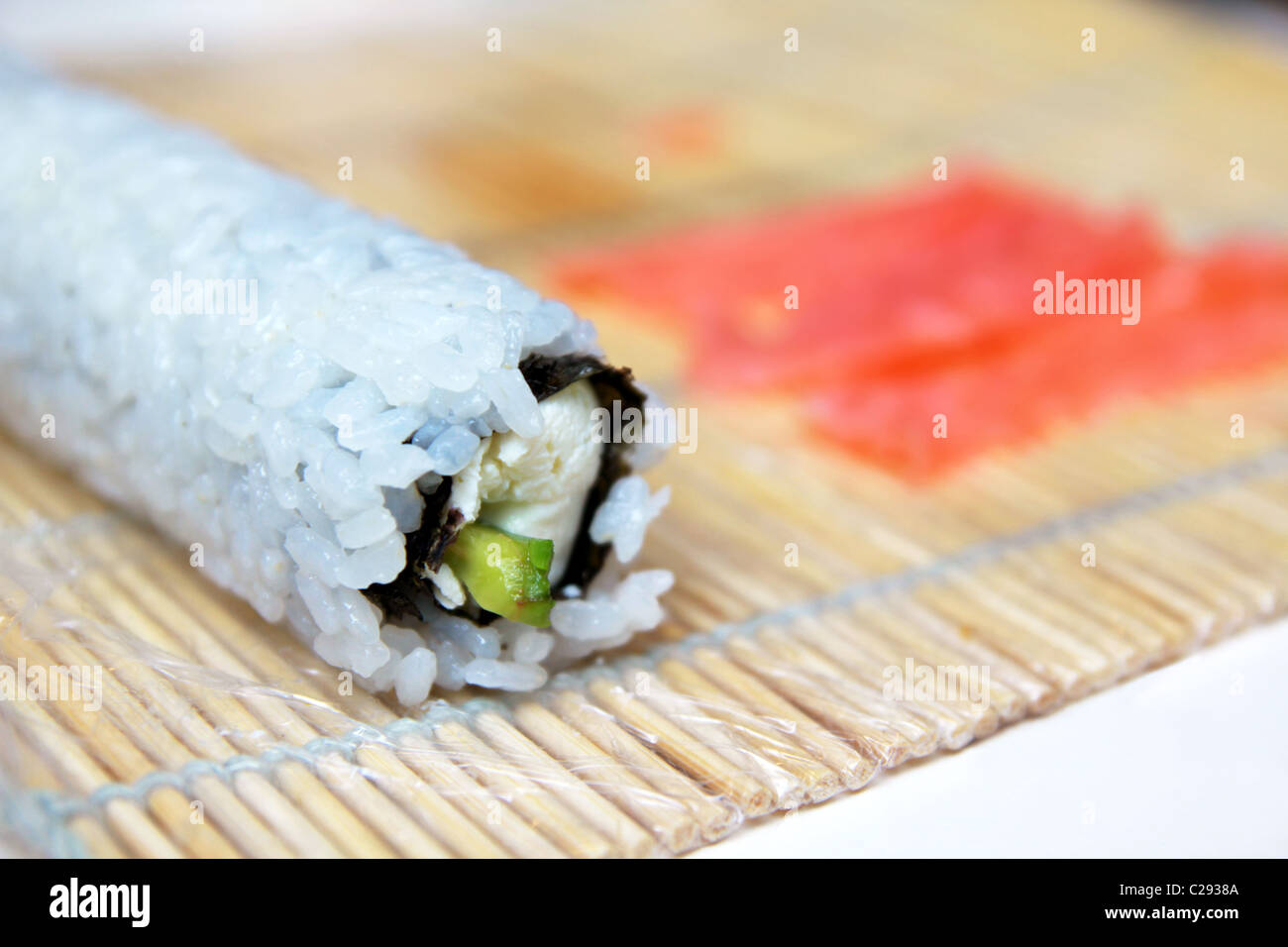 Preparation of philadelphia roll, closeup Stock Photo - Alamy