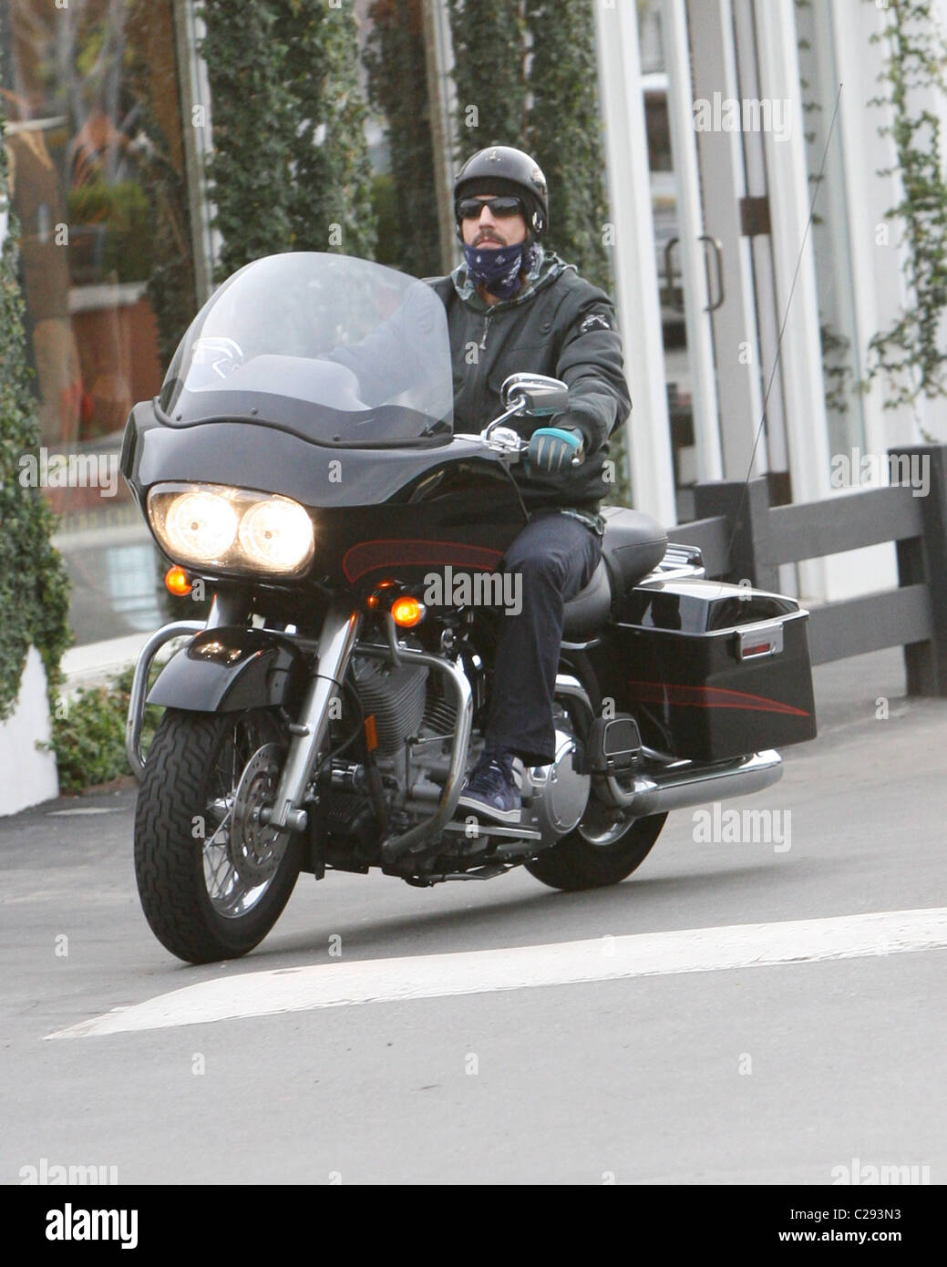 Anthony Kiedis of the Red Hot Chili Peppers takes his Harley Davidson ...