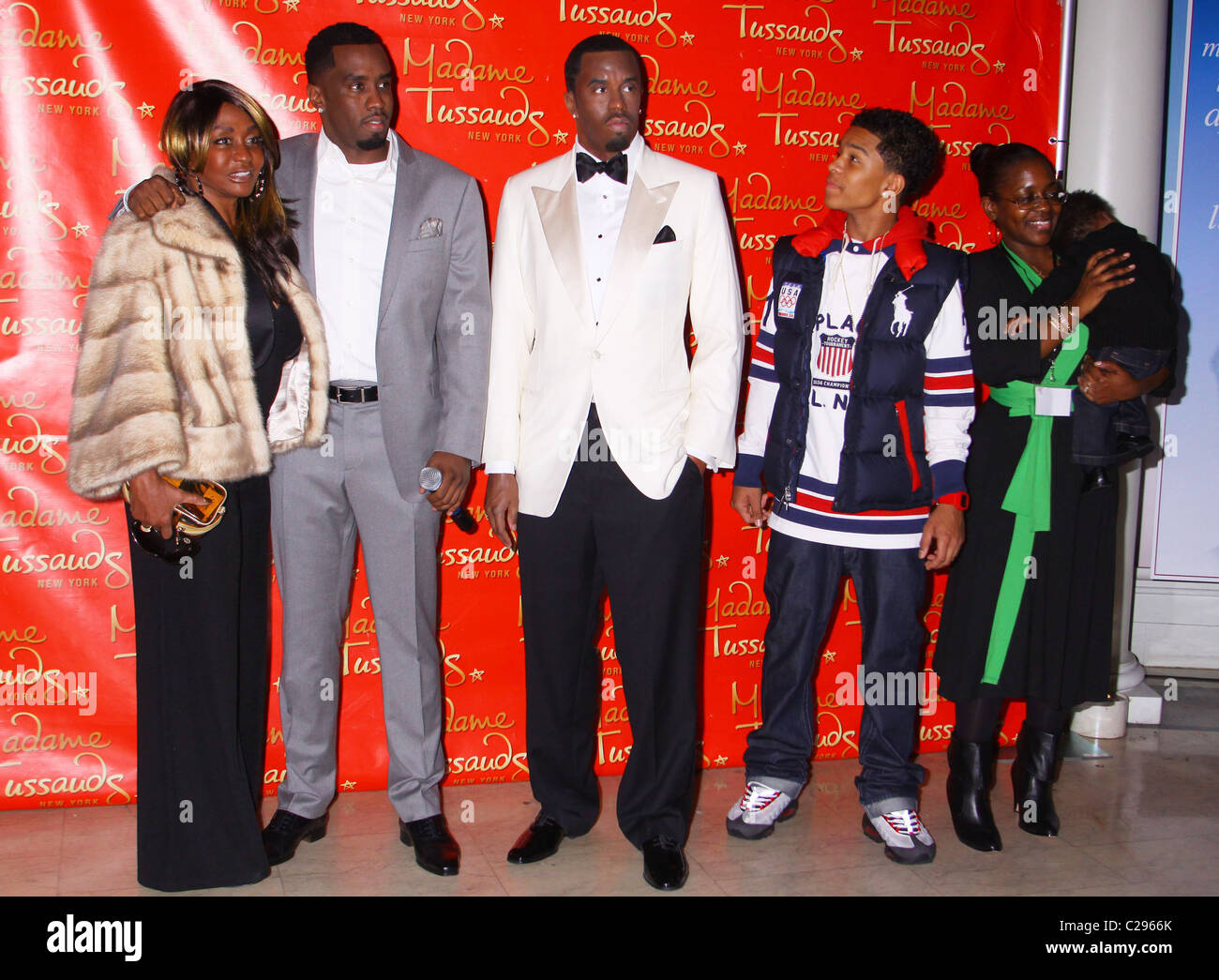 Sean Diddy Combs with his wax figure and his family at the unveiling of ...