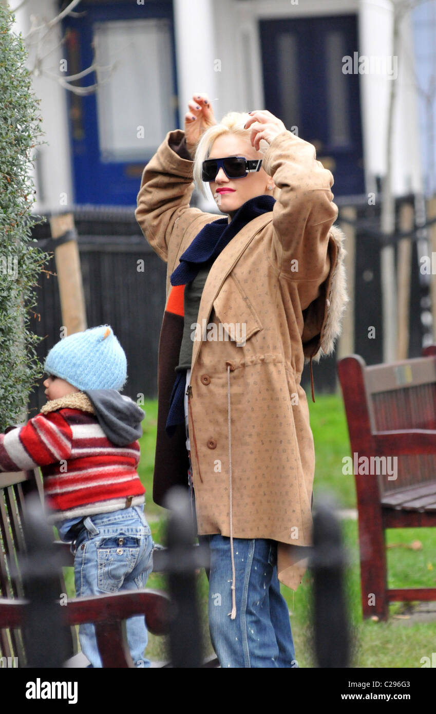 Gwen Stefani with baby Zuma by the swings at the Park London, England ...