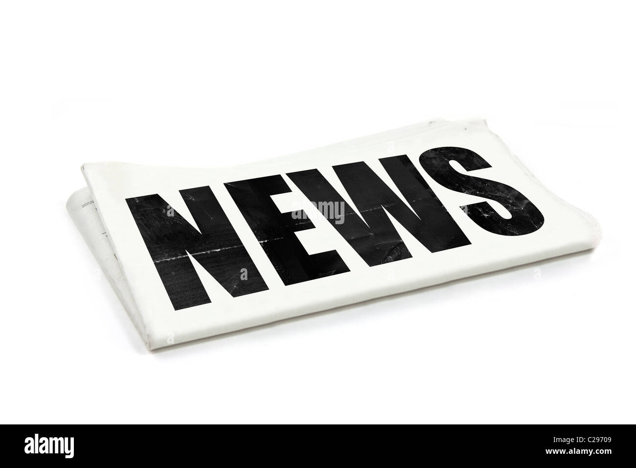 the word news as a headline on a newspaper Stock Photo - Alamy