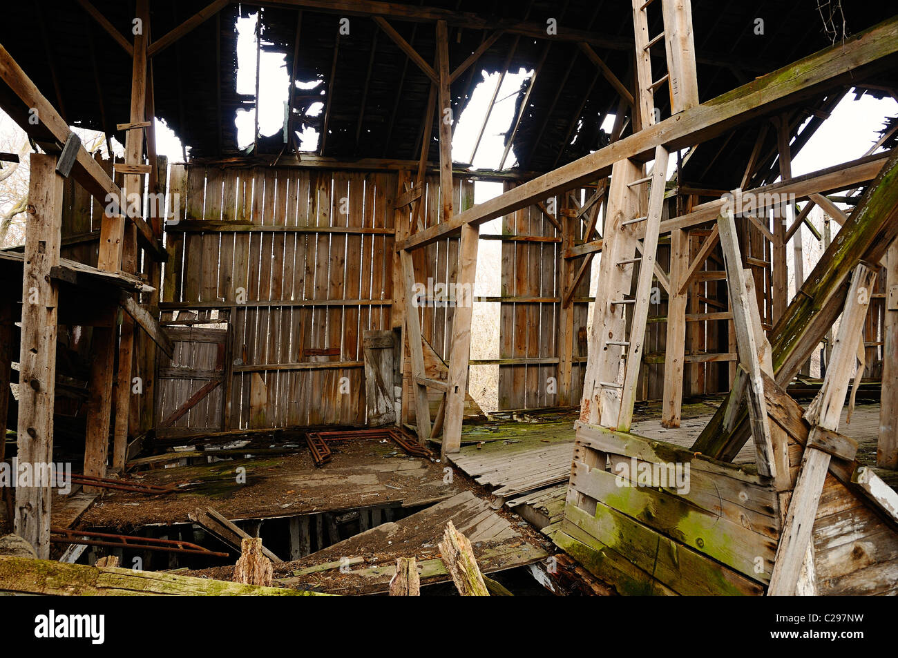 Interior of decaying barn Stock Photo - Alamy