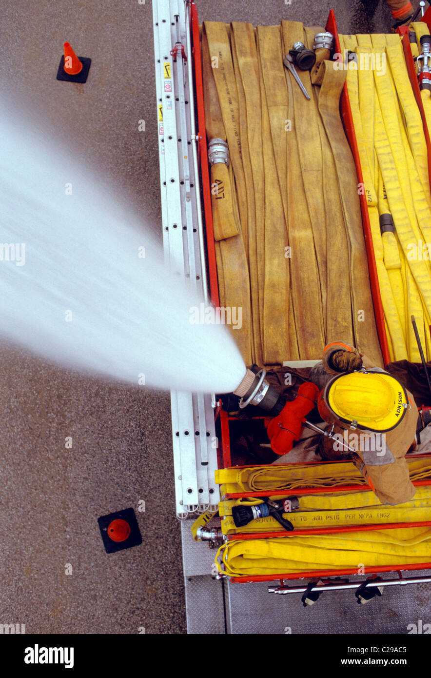Emergency fire hose hi-res stock photography and images - Alamy