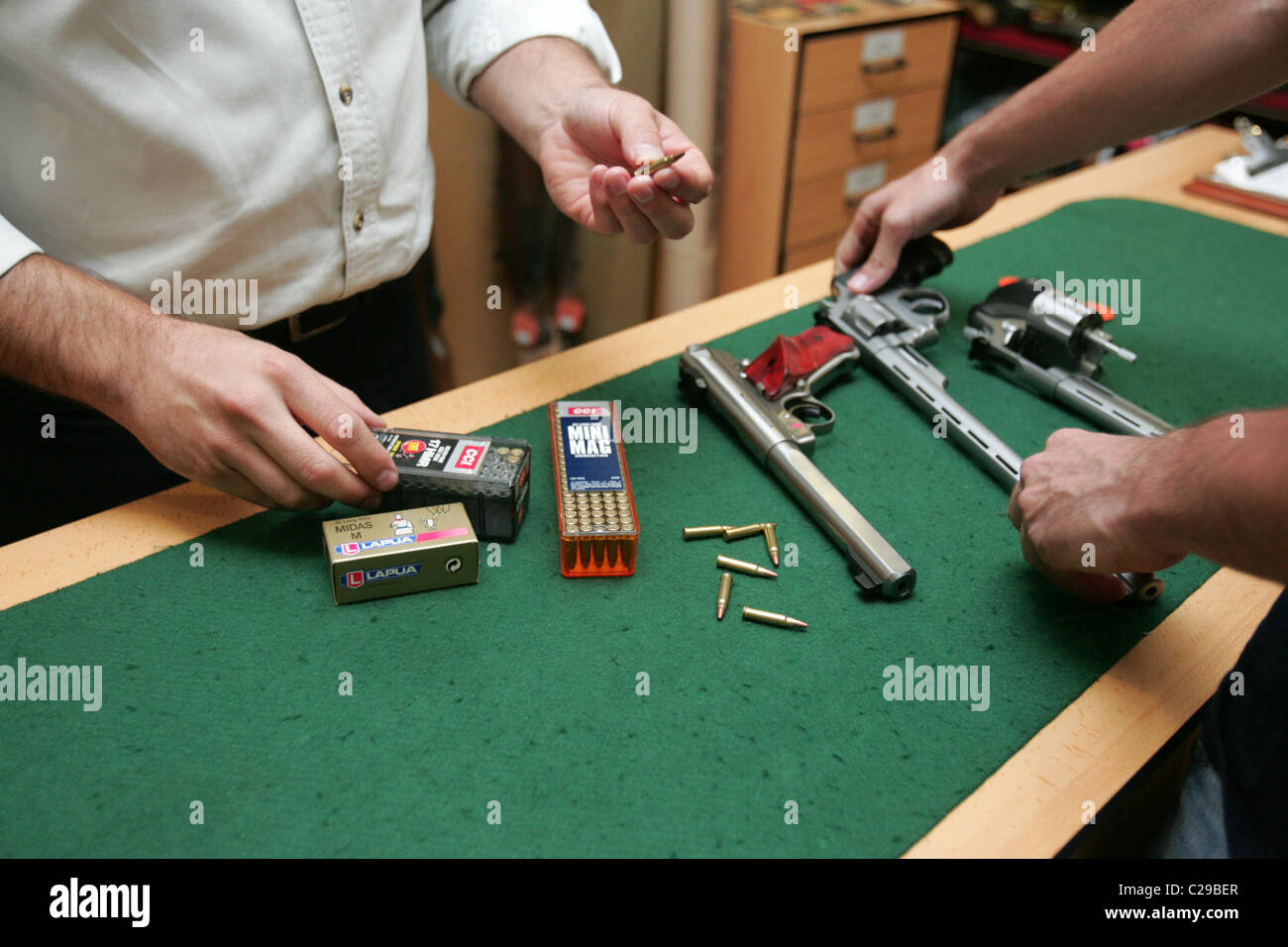 Buying guns hi-res stock photography and images - Alamy
