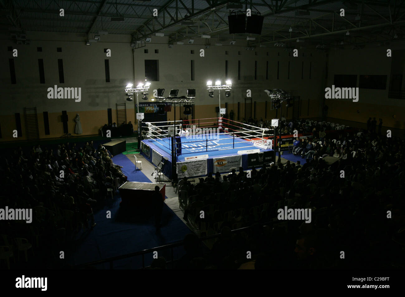 Empty Boxing Ring With Crowd