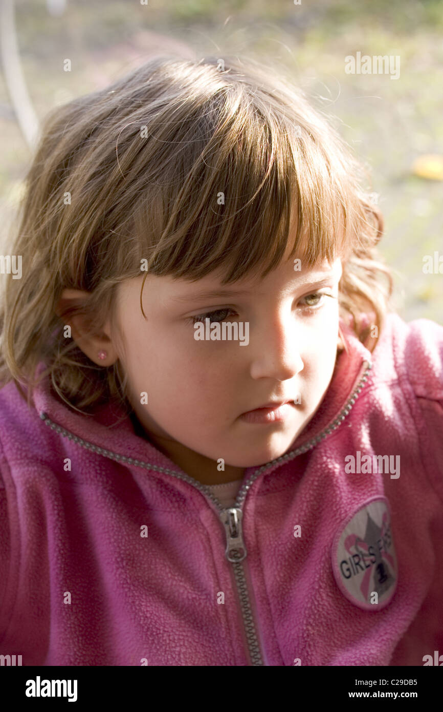Girl sad child alone Stock Photo - Alamy