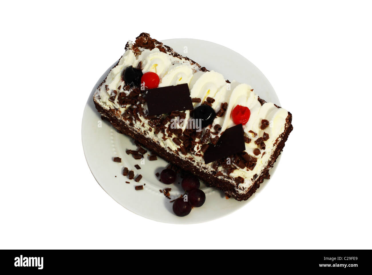 wonderful cake with cherry and grape isolated Stock Photo - Alamy