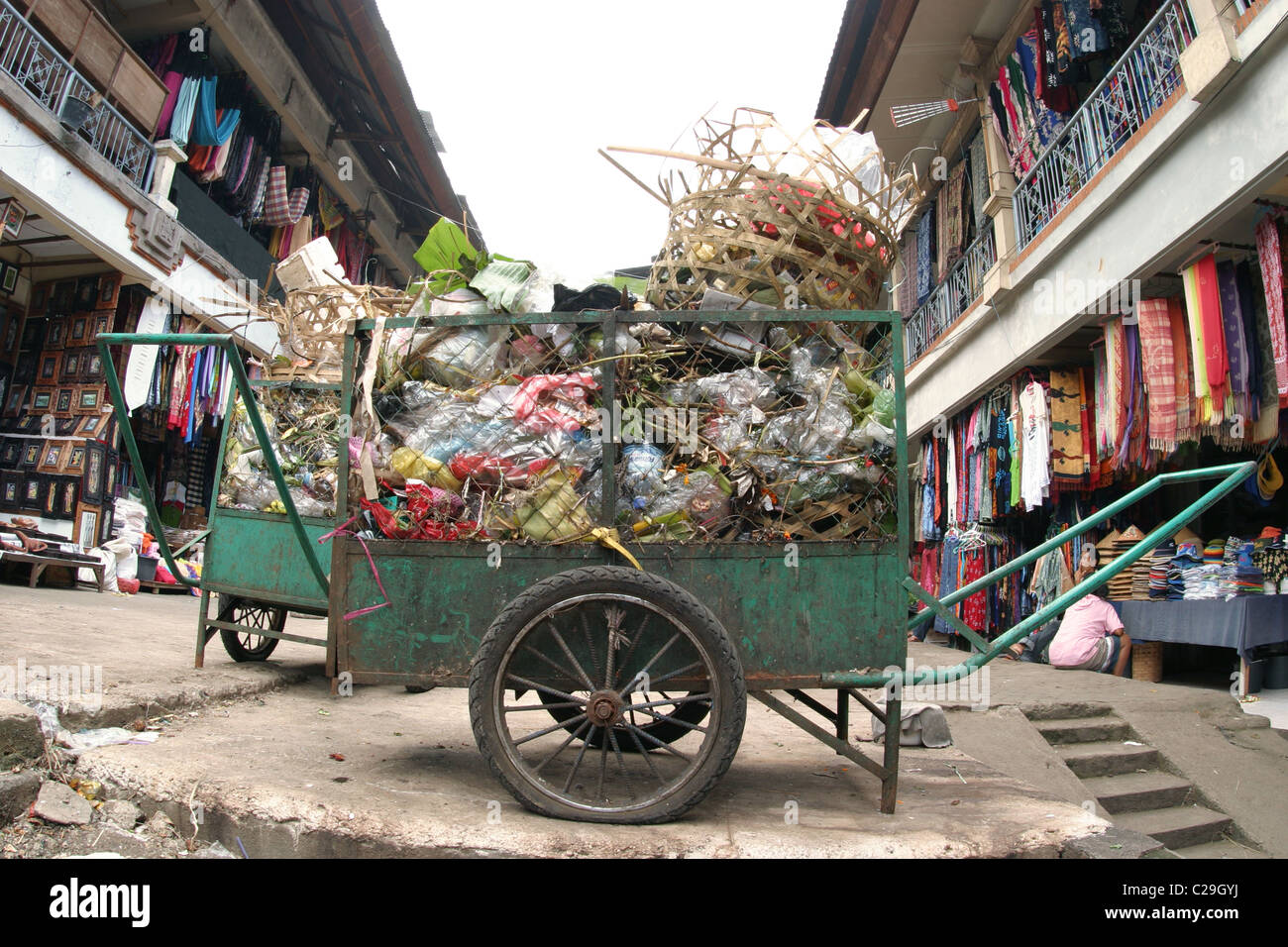 Cart full of trash at an open market Stock Photo - Alamy