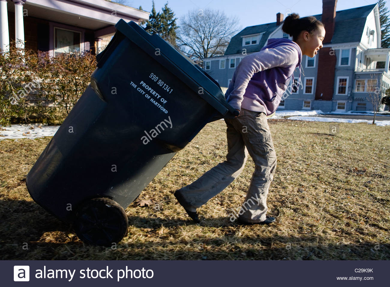 Person Taking Garbage Out Stock Photos & Person Taking Garbage Out ...