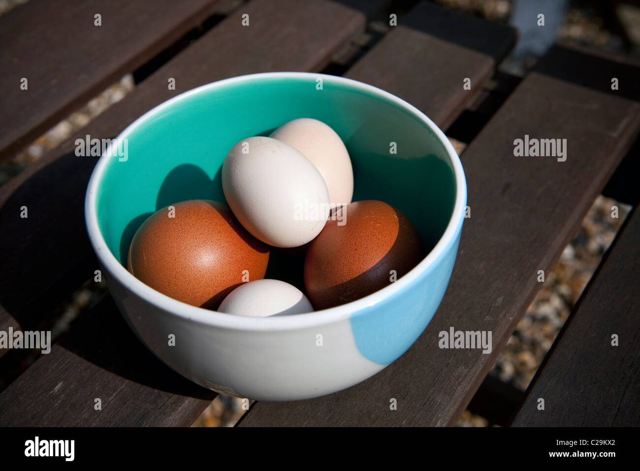 Bowl of free range irregular shaped and coloured eggs Stock Photo - Alamy