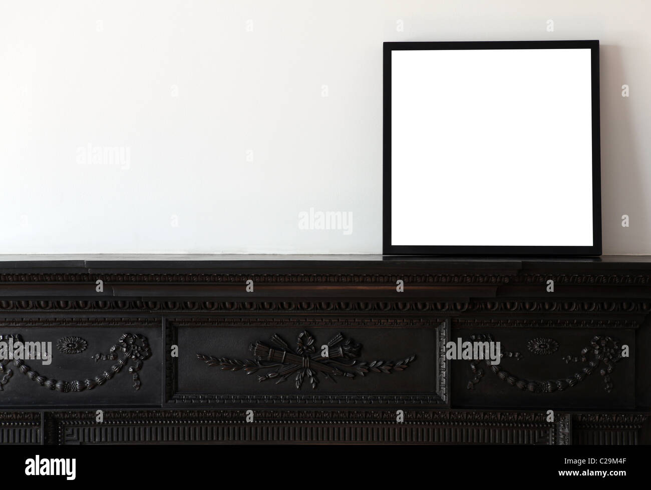 Blank photo frame on mantle piece hi-res stock photography and images ...