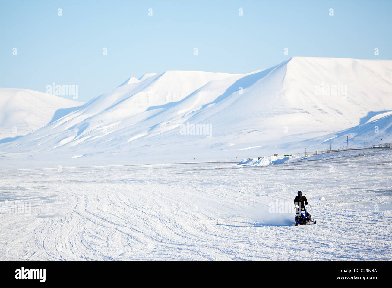 Snowmobile with gun hi-res stock photography and images - Alamy