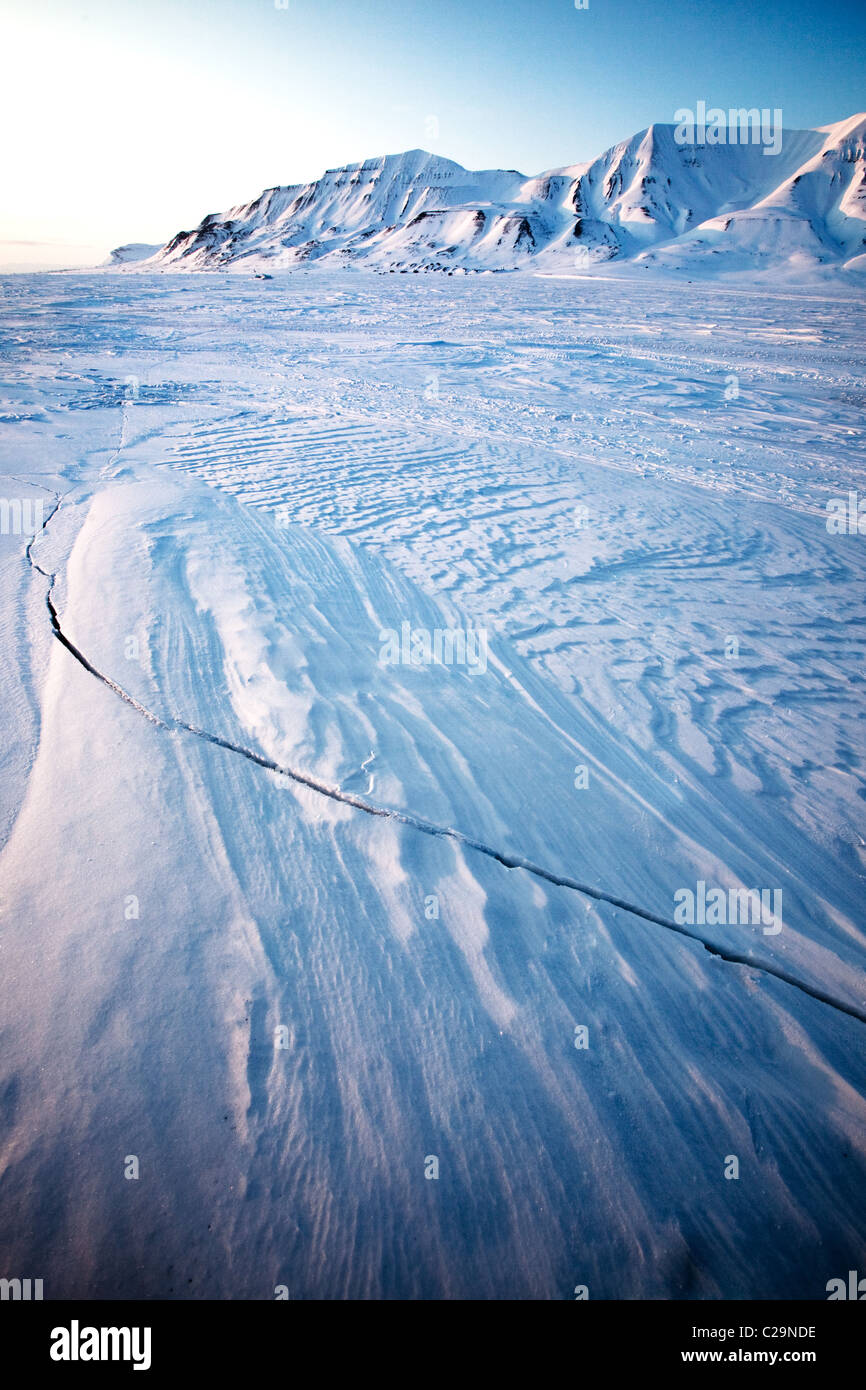 A landscape on the island of Spitsbergen, Svalbard, Norway late at ...