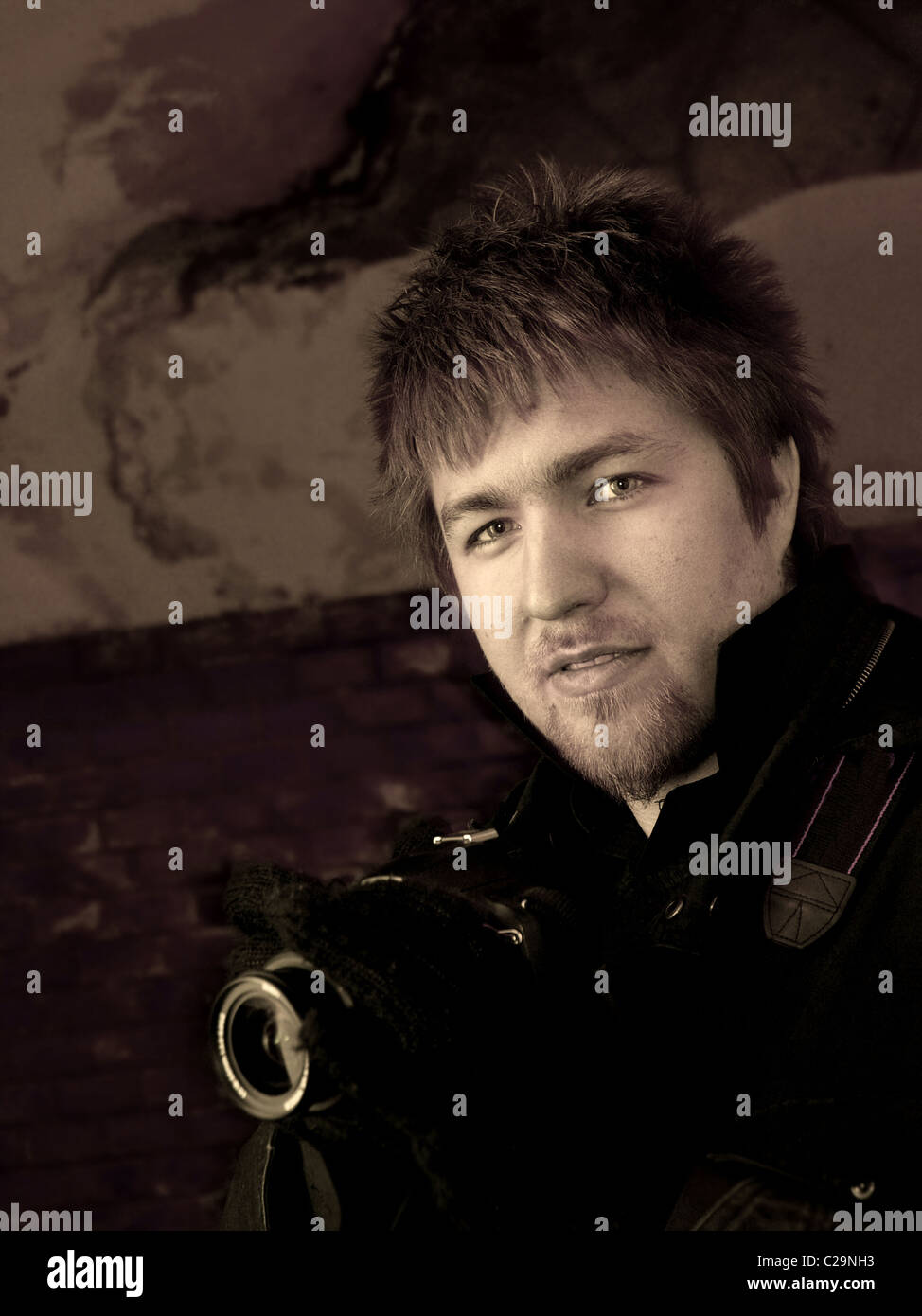 Portrait of a photographer in a dark indoor place Stock Photo - Alamy