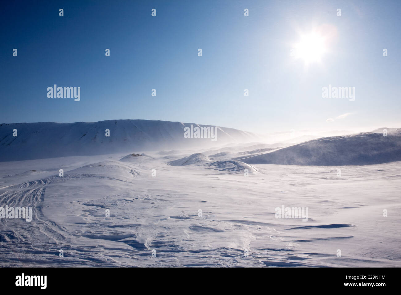 Blowing snow in a barren winter mountain landscape Stock Photo - Alamy
