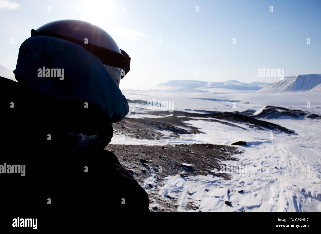A winter adventure guide on a barren winter landscape Stock Photo - Alamy