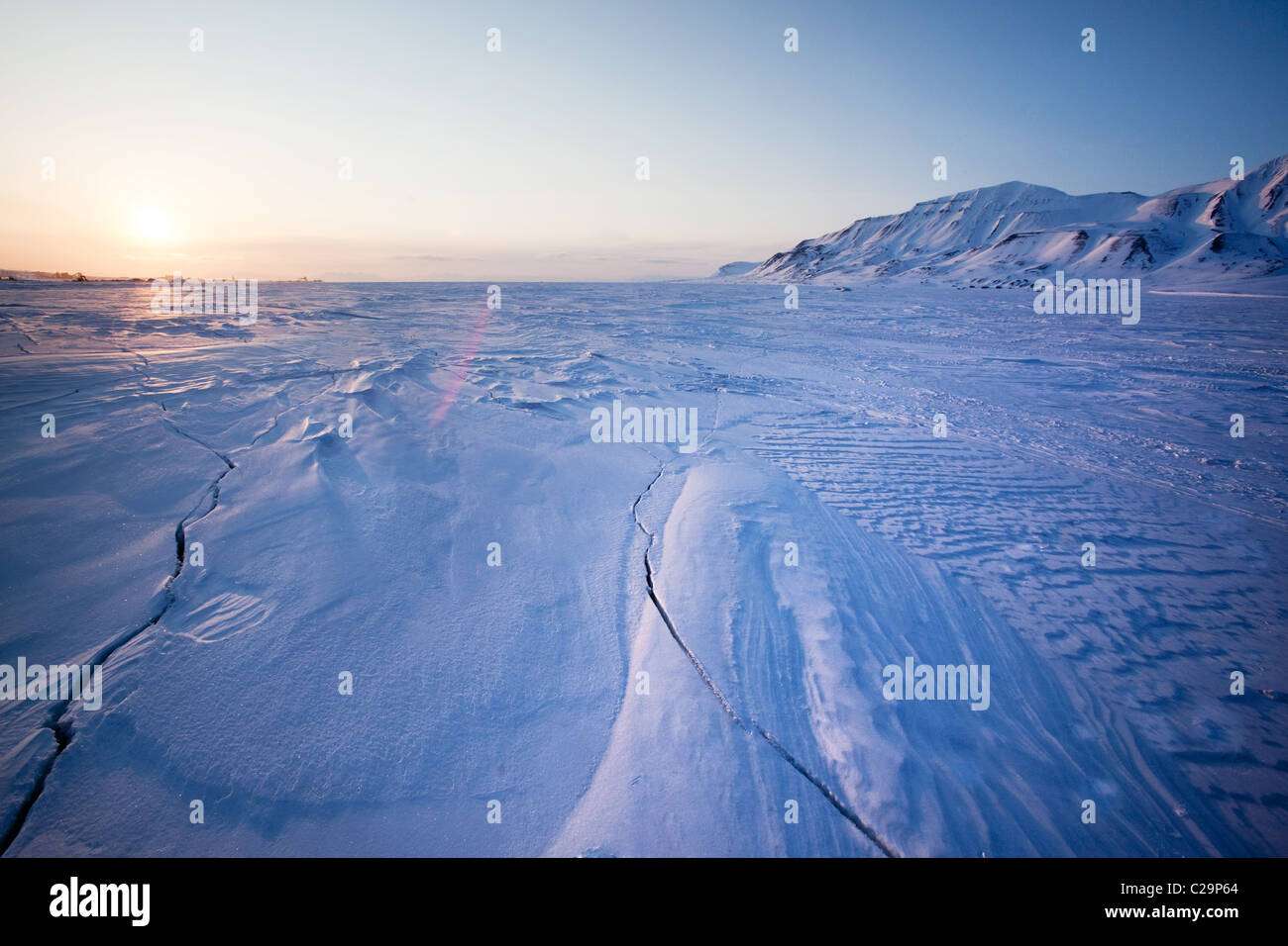 A landscape on the island of Spitsbergen, Svalbard, Norway late at ...