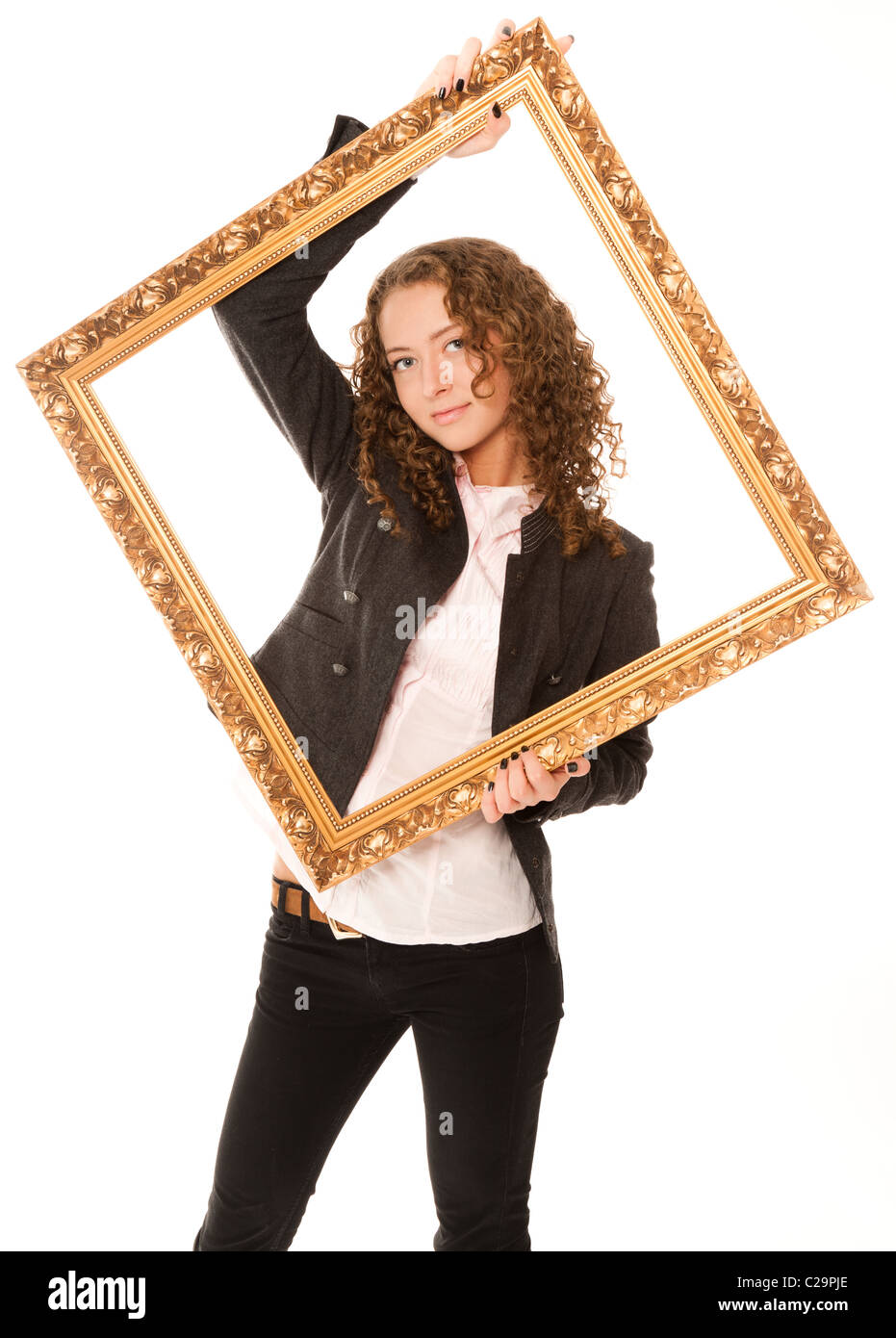 Beautiful woman standing and holding gold frame isolated on white Stock ...