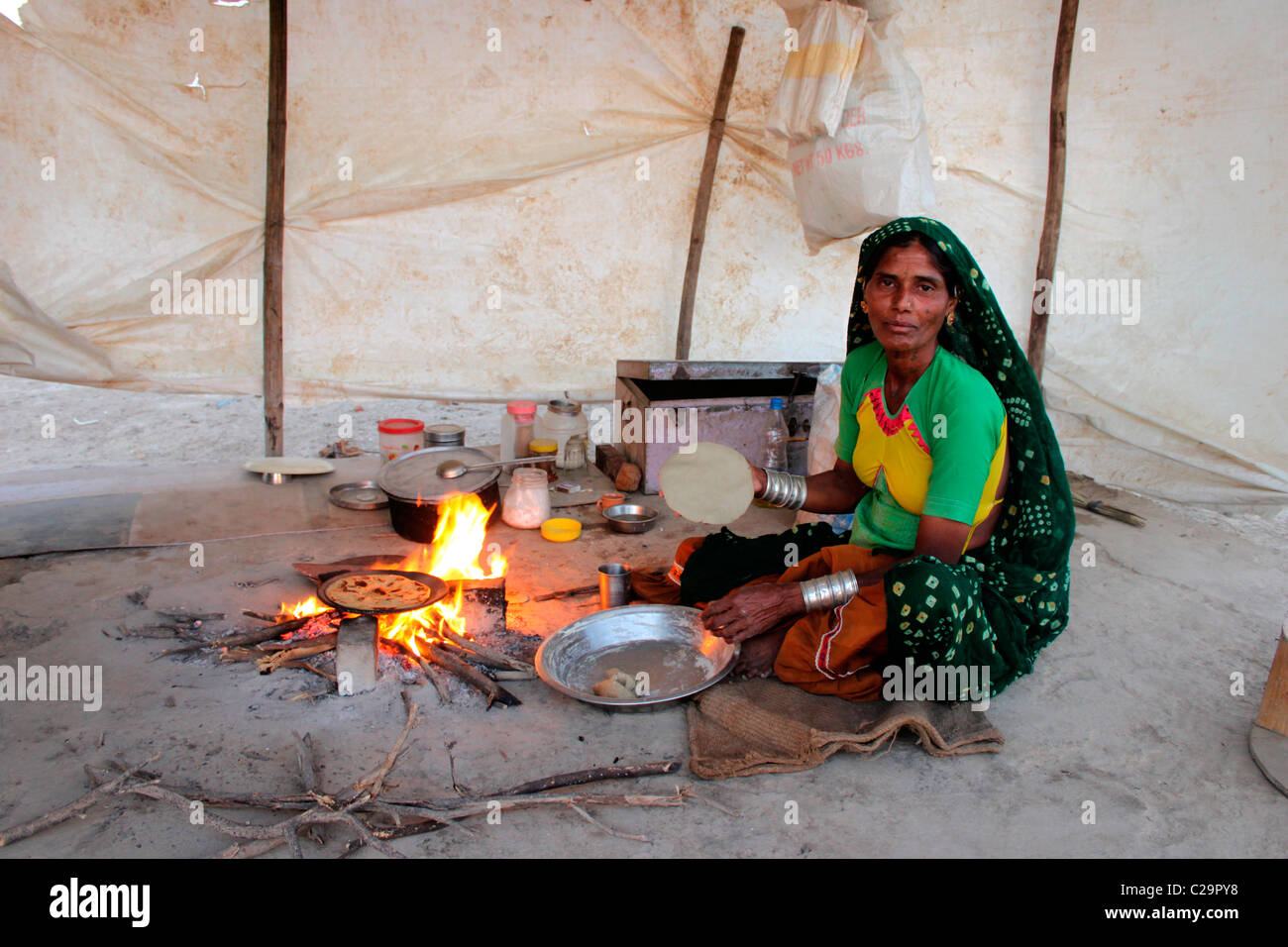 Indian Rural Woman Cooking Food High Resolution Stock Photography and ...