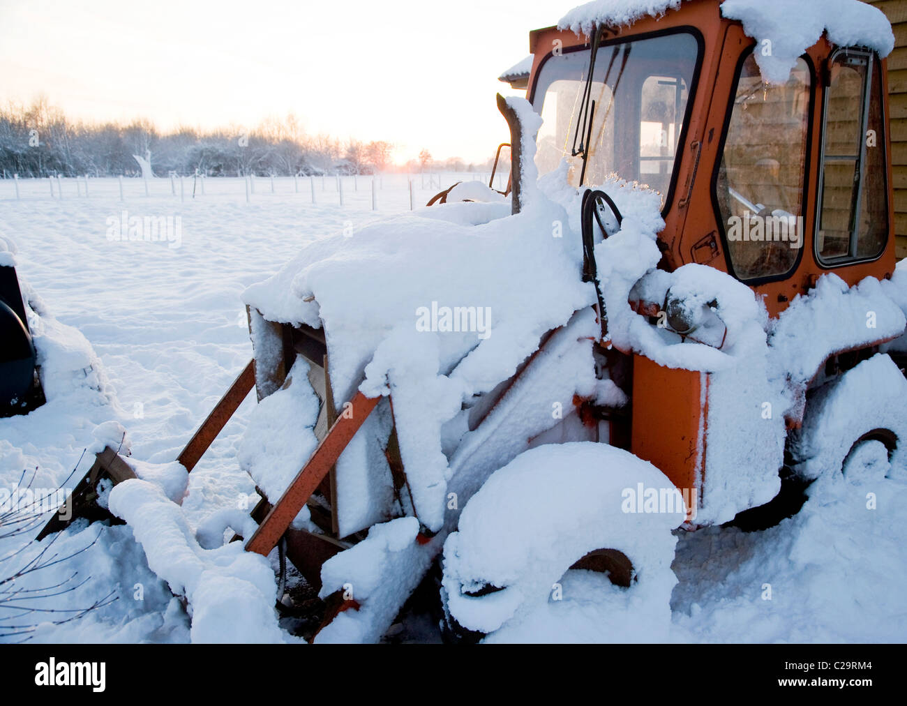Snow covered farm machinery hi-res stock photography and images - Alamy