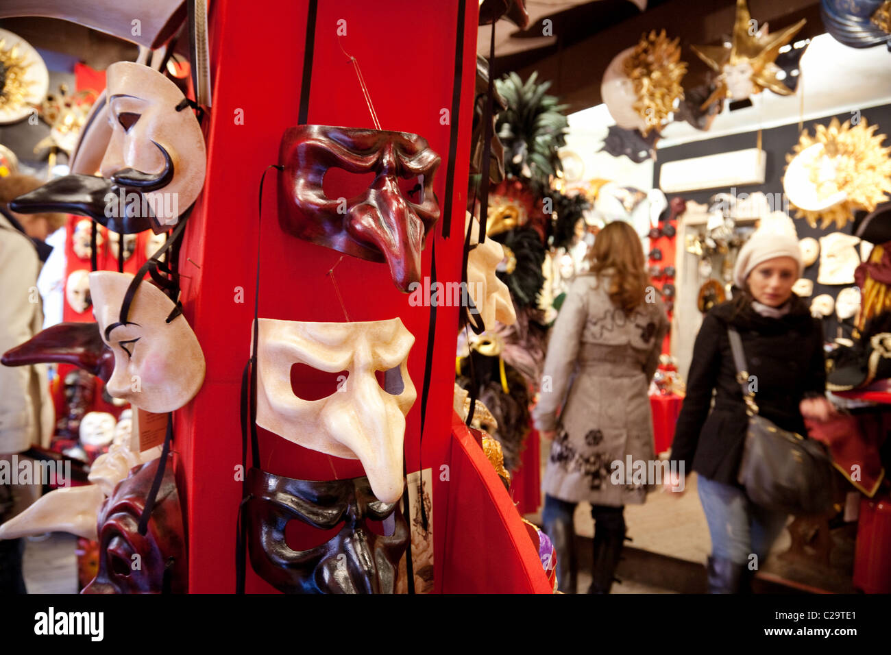 People shopping in a mask shop, Venice, Italy Stock Photo - Alamy