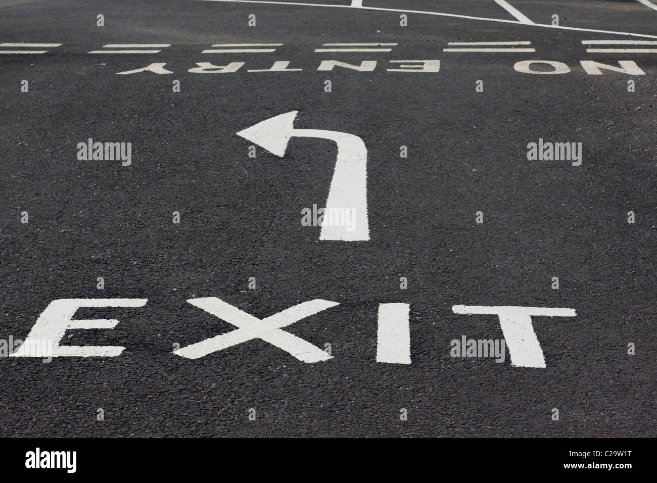 An exit and No Entry painted road markings Stock Photo - Alamy